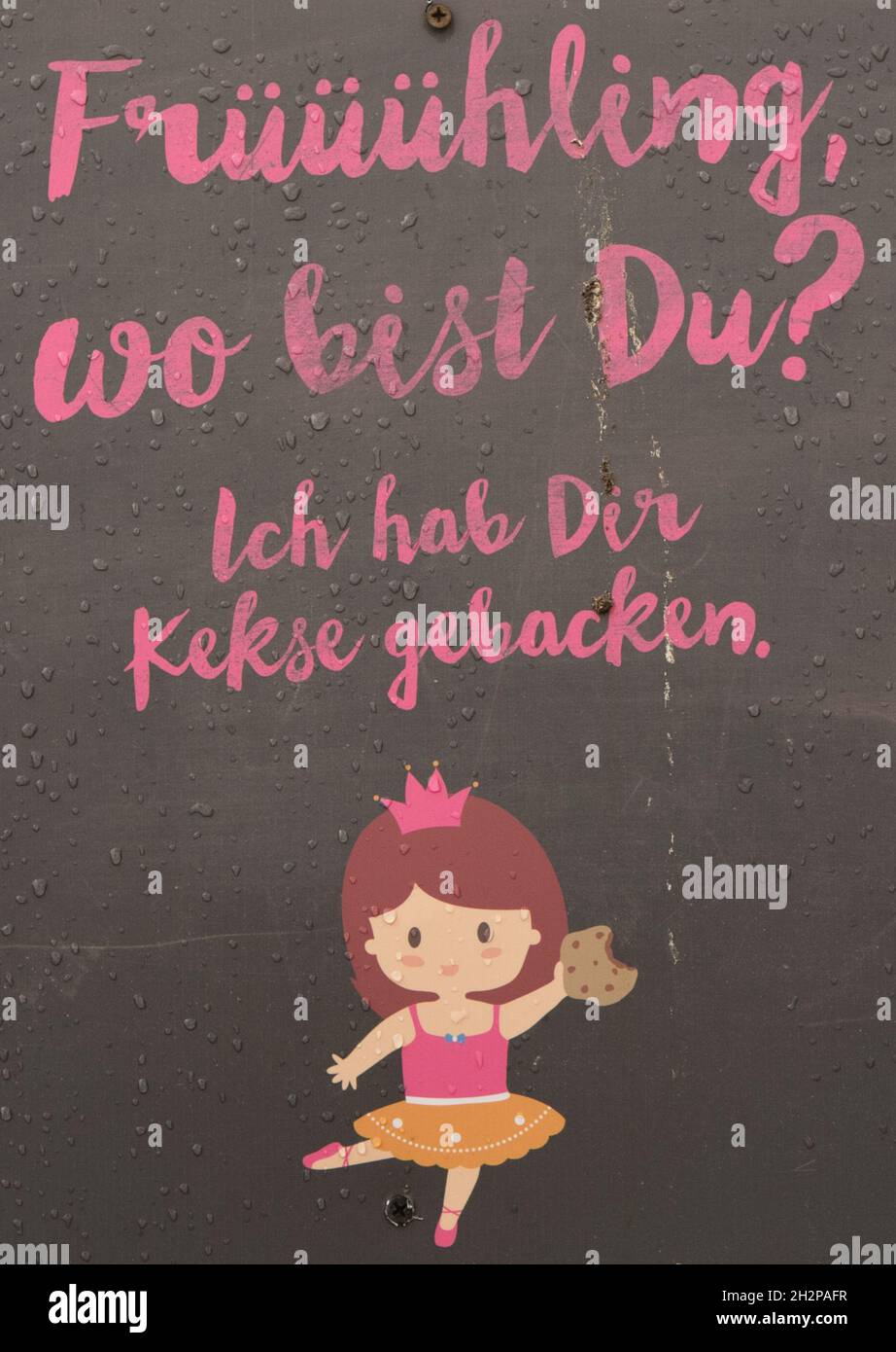 funny saying on metal sign. to grin Stock Photo - Alamy