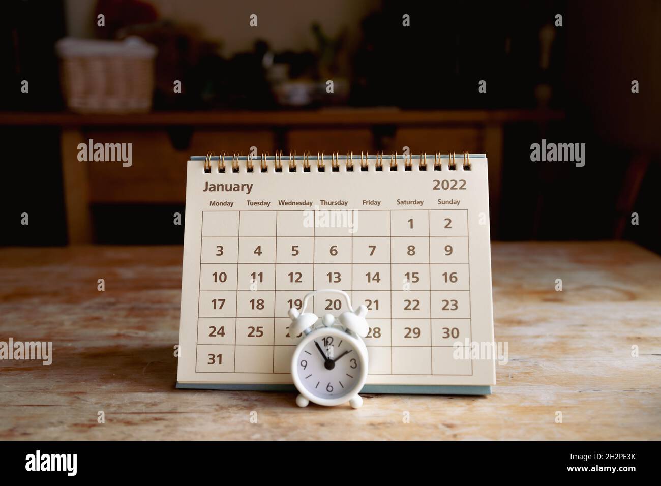 January 2022 calendar month page nad little vintage alarm clock Stock ...