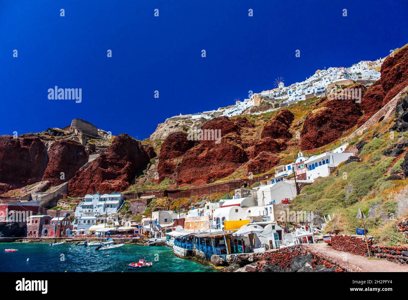 GREECE, SANTORINI. ATHINIOS HAFEN HARBOUR WITH FIRA VILLAGE ON TOP ...
