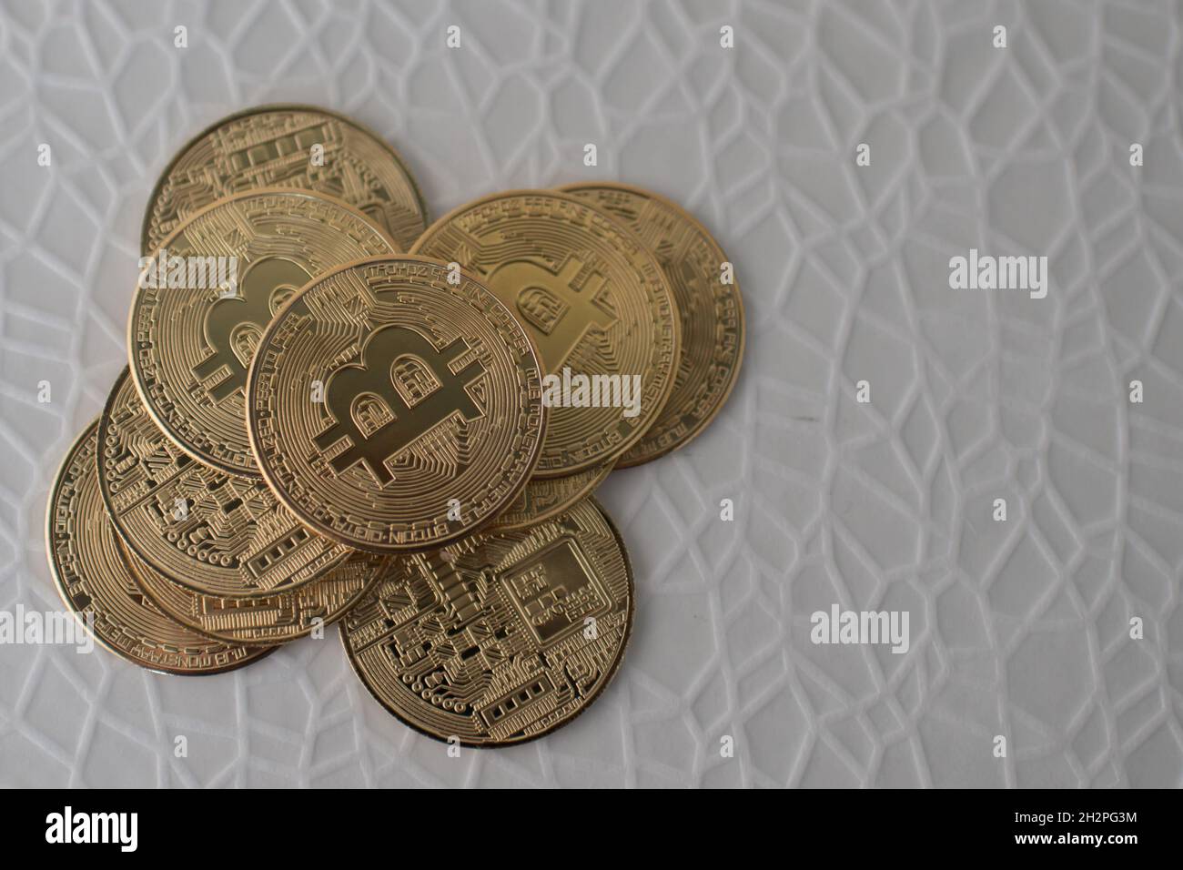 Pile of bright coins with white background. Crypto currency. Risk Stock ...