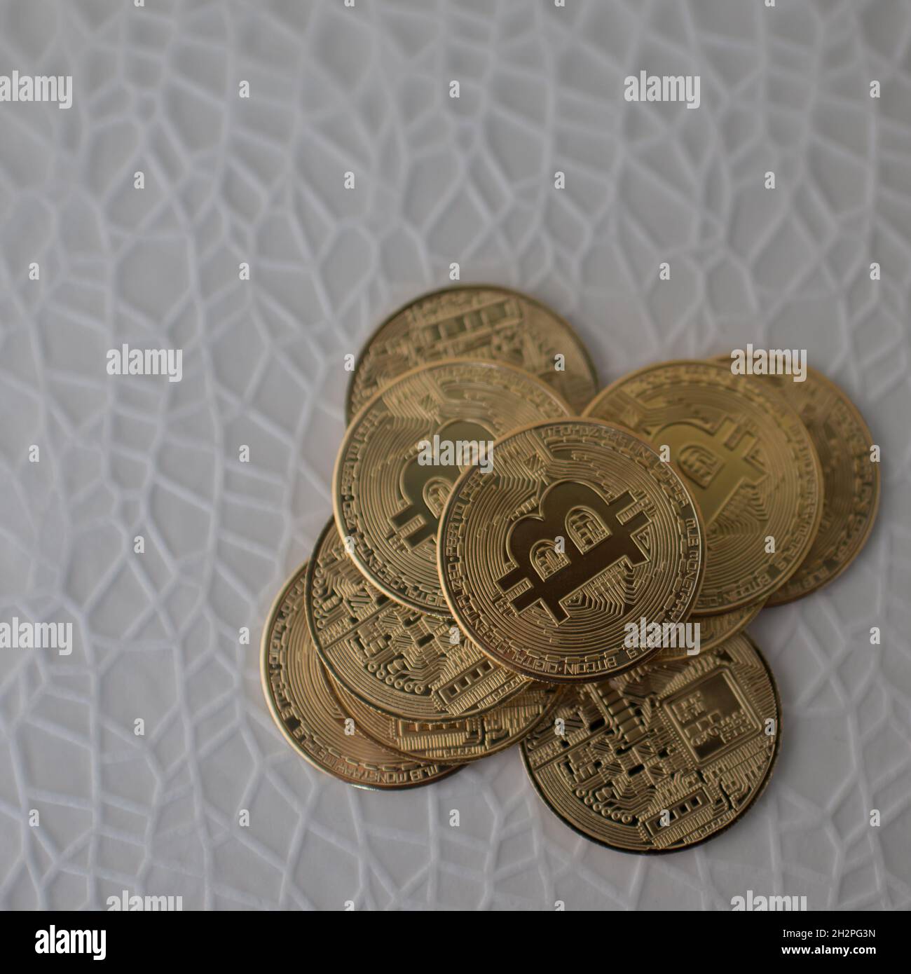 Pile of bright coins with white background. Crypto currency. Risk Stock ...