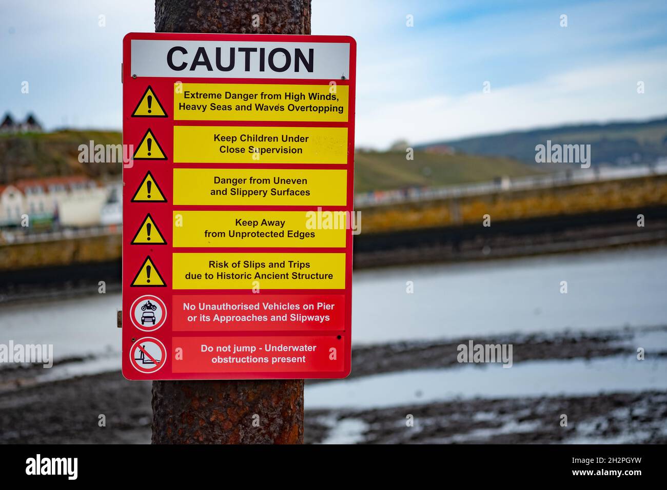 Whitby, Yorkshire, UK – October 20 2021. Warning sign advising of the ...