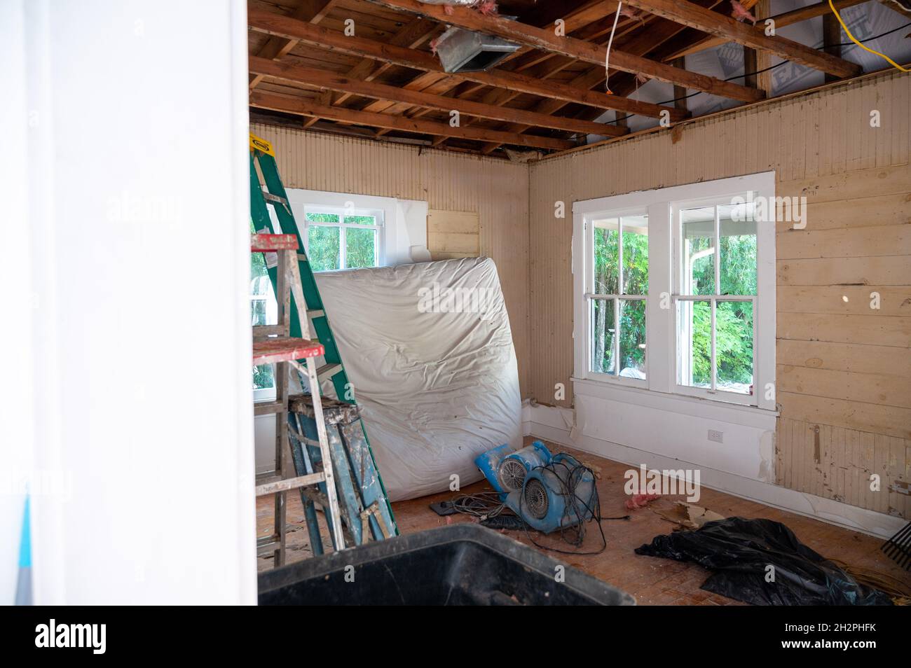 Messy destroyed house after a natural disaster Stock Photo - Alamy