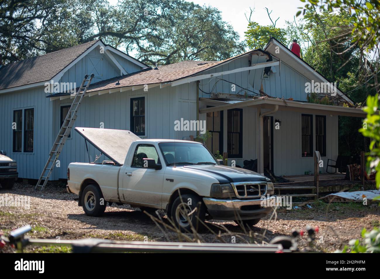 Messy destroyed house after a natural disaster Stock Photo - Alamy