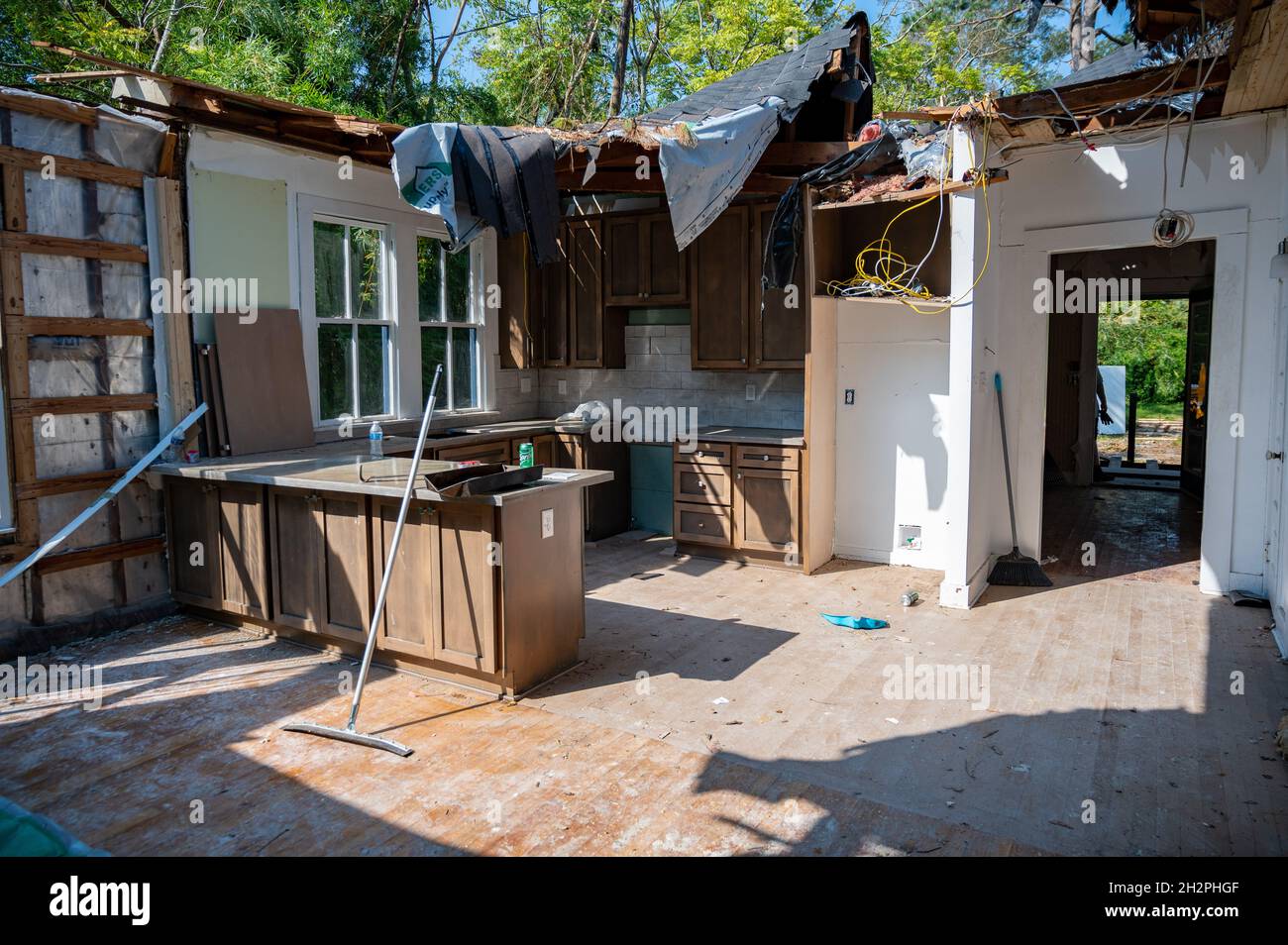 Messy destroyed house after a natural disaster Stock Photo - Alamy