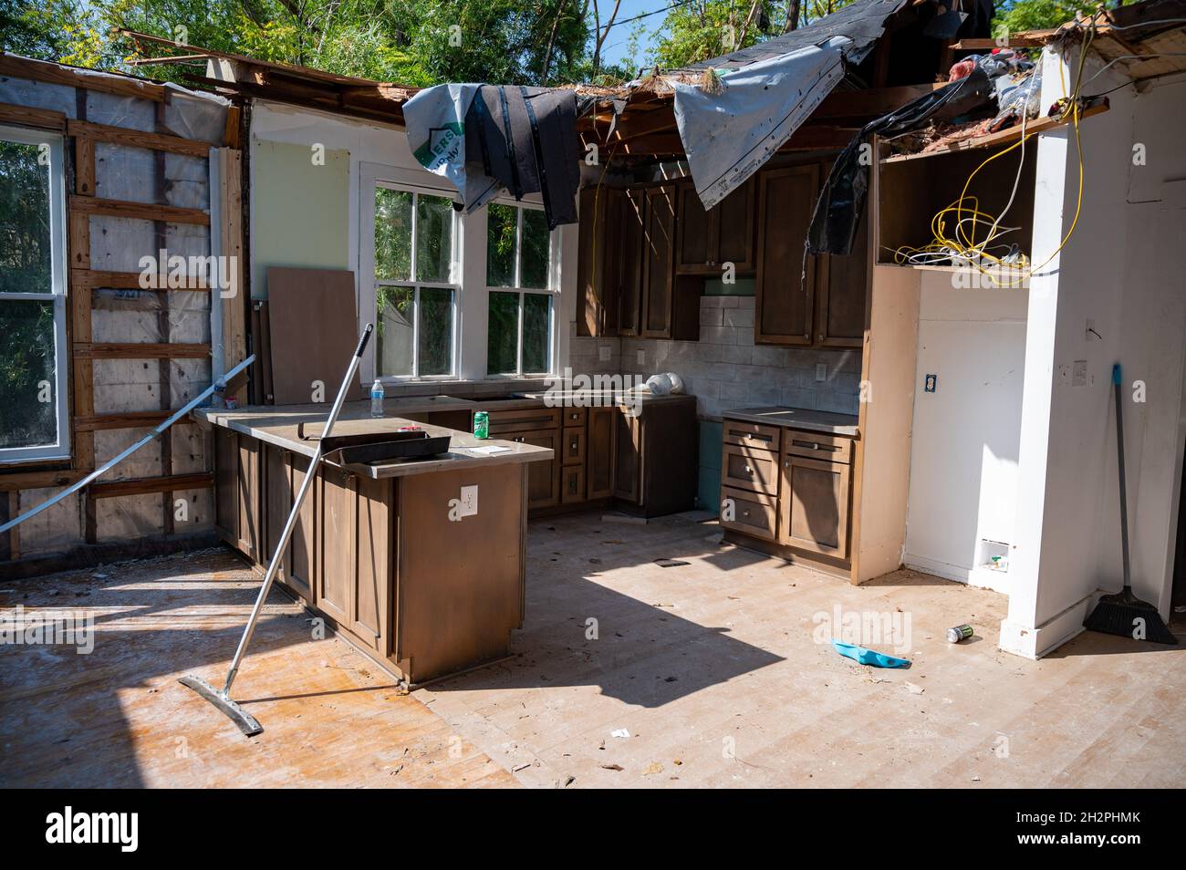 Messy destroyed house after a natural disaster Stock Photo - Alamy