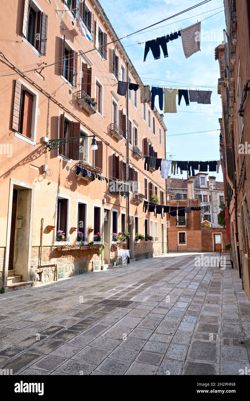 Washing lines across an alley in Venice, Italy. Laundry hanging on a ...