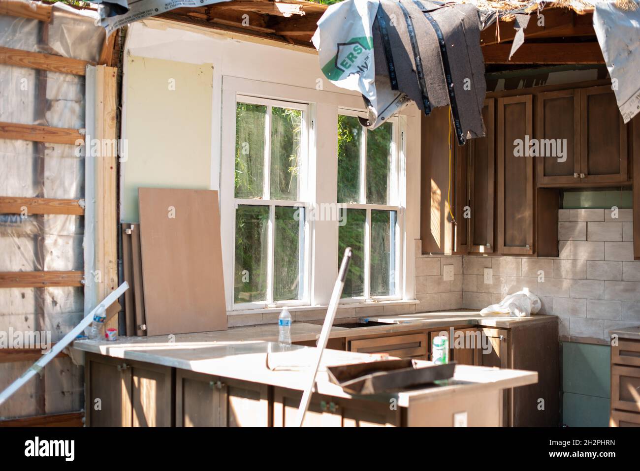 Messy destroyed house after a natural disaster Stock Photo - Alamy
