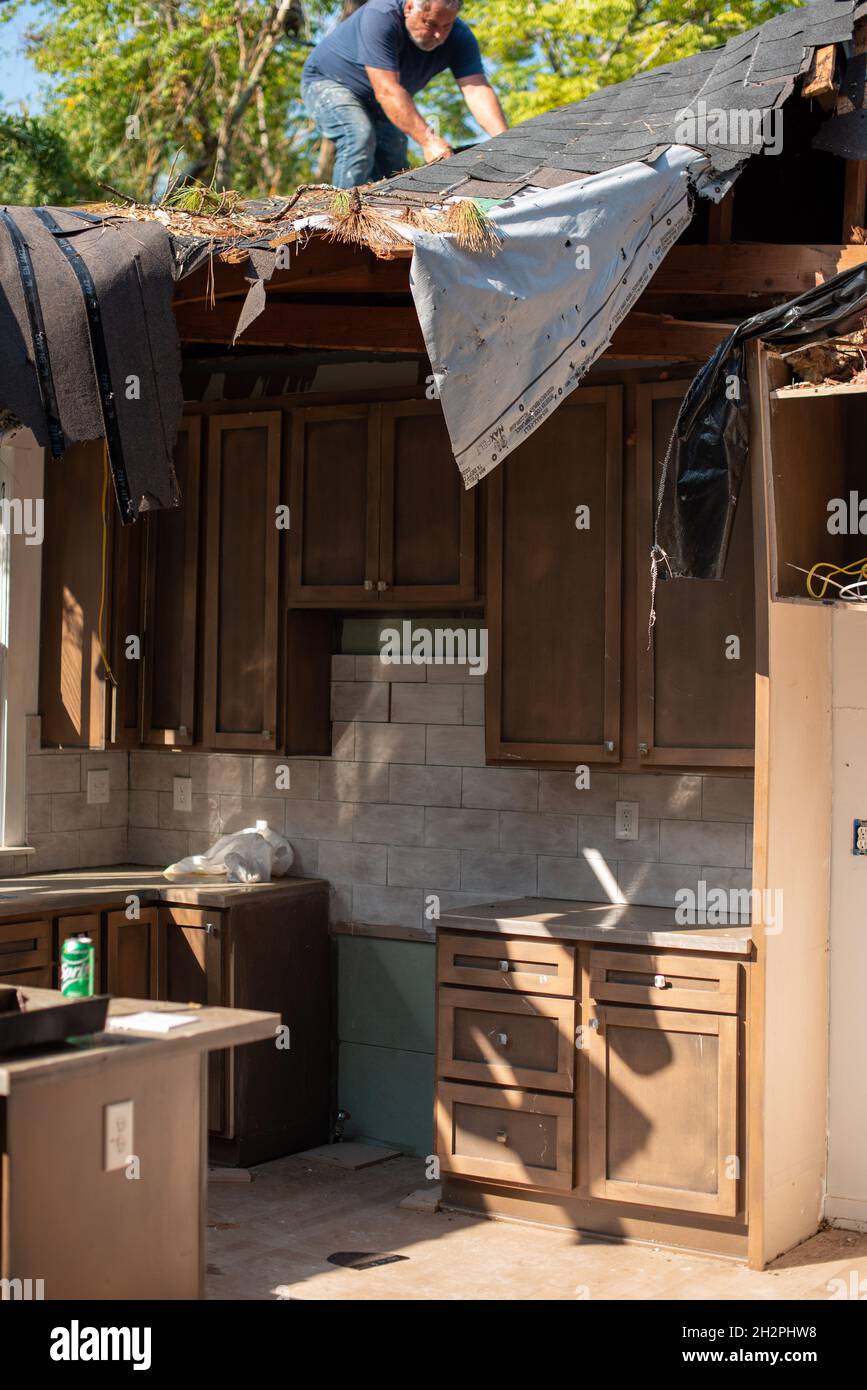 Man cleaning house after flood hi-res stock photography and images - Alamy