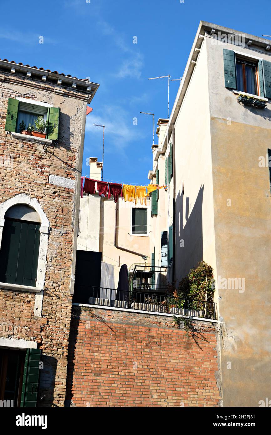 Washing lines in an alley in Venice, Italy. Laundry hanging on a ...