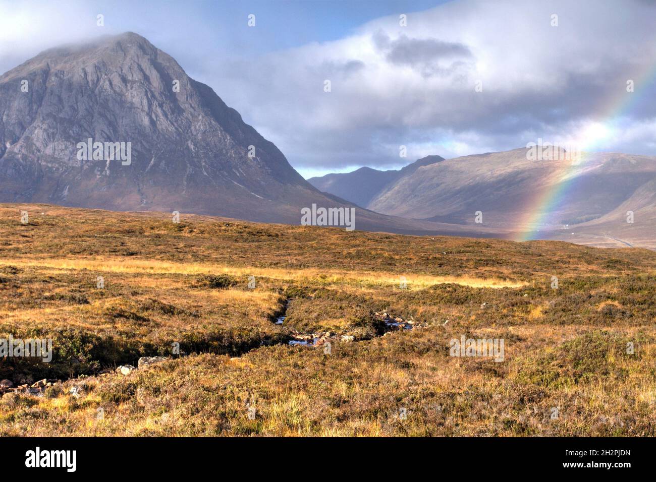 Glencoe from Rannoch Moor with Buachaille Etive Mor and a rainbow Stock ...