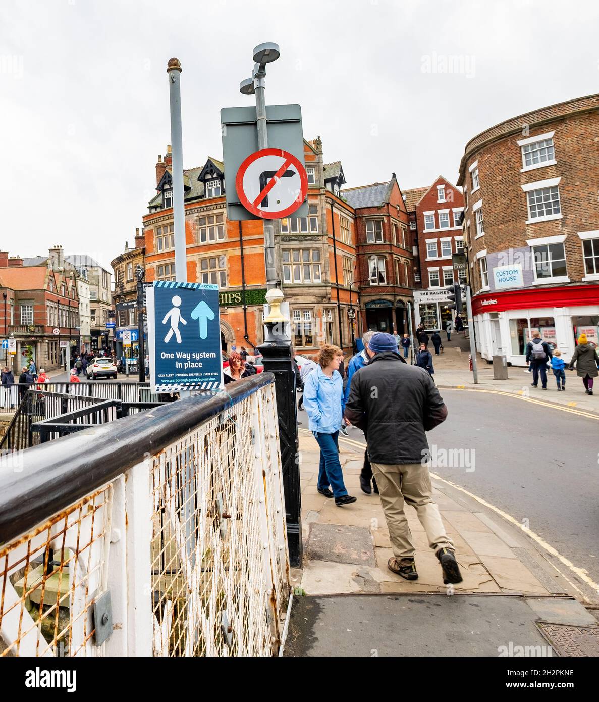 Whitby, Yorkshire, UK – October 18 2021. Pedestrian one way system sign ...