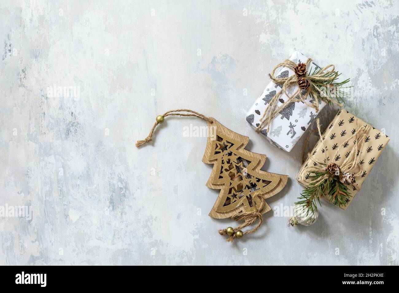 Christmas flat lay with Christmas decorations and presents on a grey ...