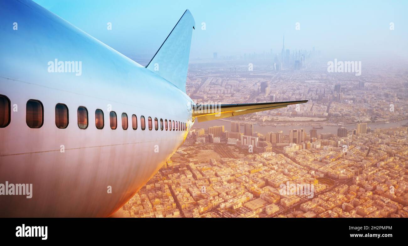View of airplane tail take off from Dubai, UAE Stock Photo - Alamy
