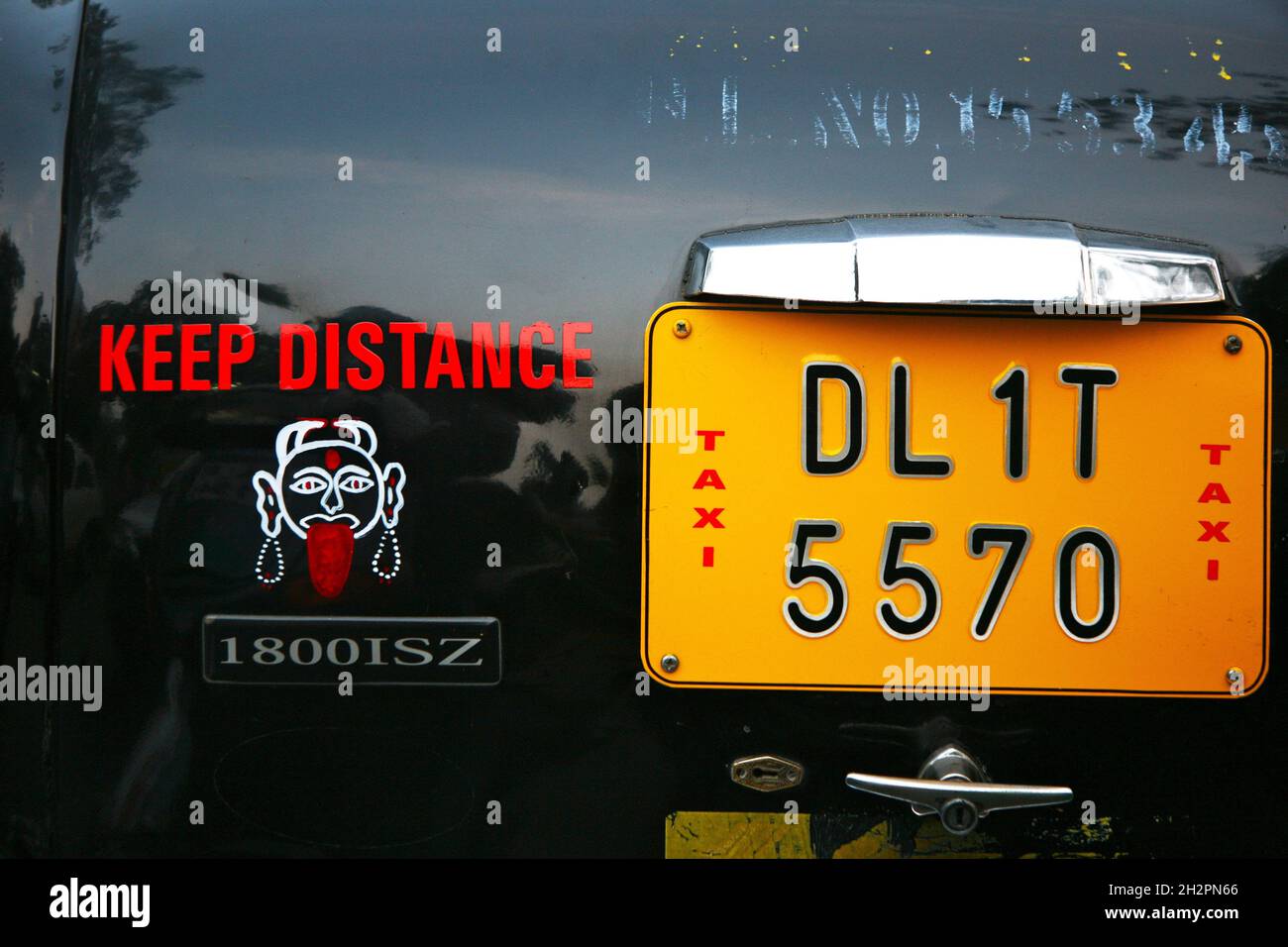 INDIA. TRUNK OF A CAR AMBASSADOR ICONIC INDIAN ROADS. IT IS DECORATED ...