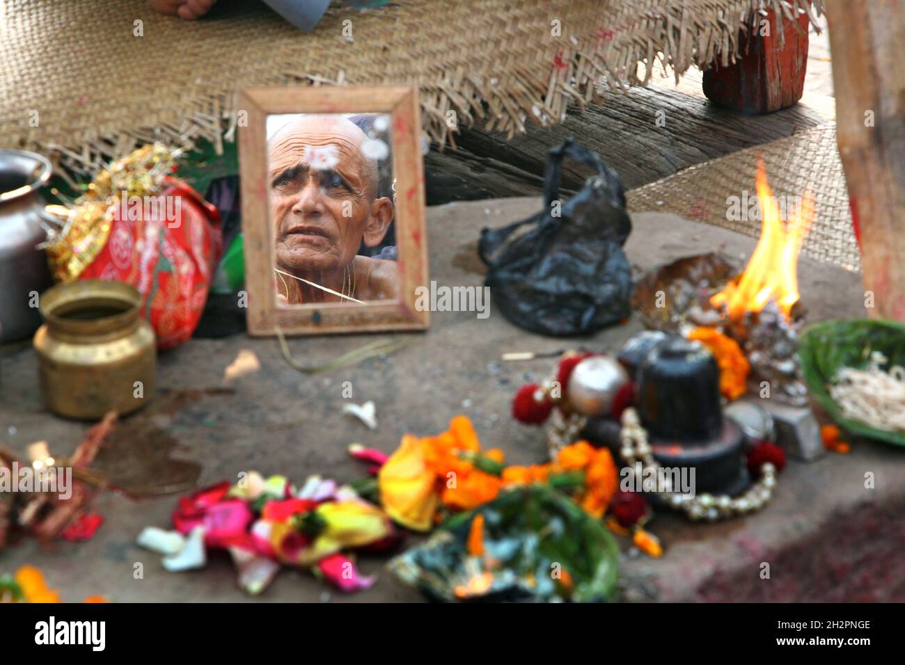 INDIA. REFLECTION OF A MAN ON A CHAUKI IN VARANASI (BENARES Stock Photo ...