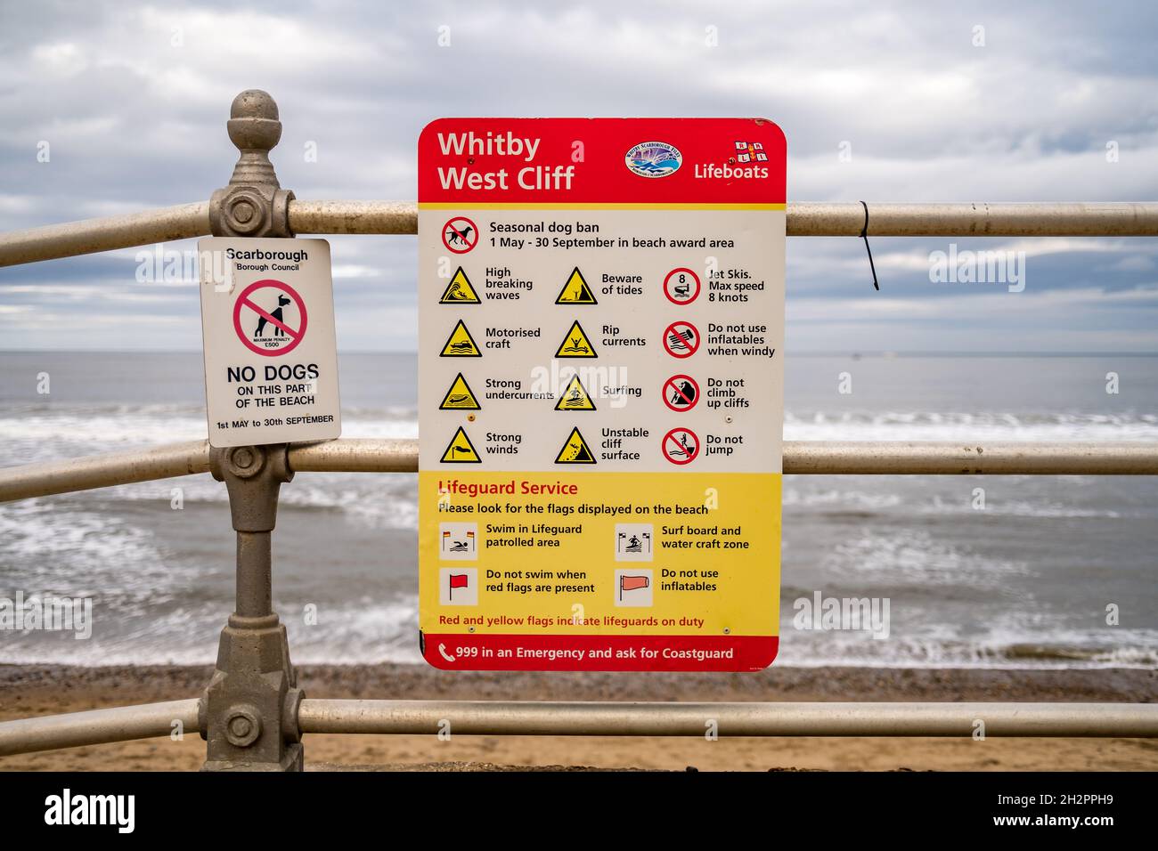 Whitby, North Yorkshire, UK – October 17 2021. RNLI sign warning beach ...