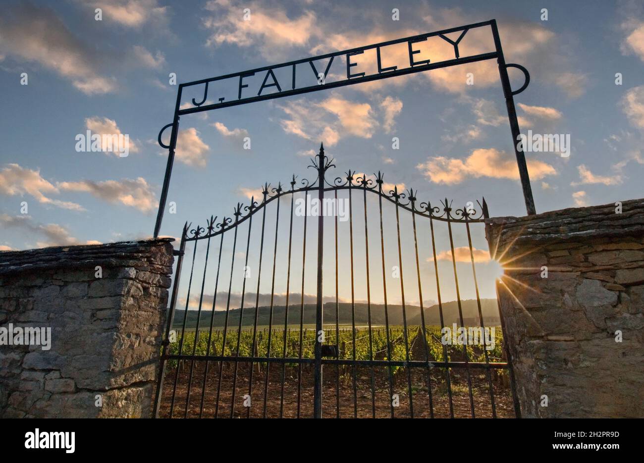 J faiveley stone wall and metal gate entrance hi-res stock photography ...