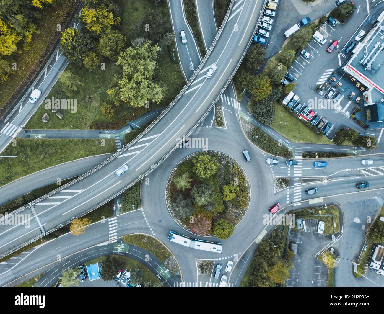 transportation, traffic in urban cityscape from above, cars driving on ...