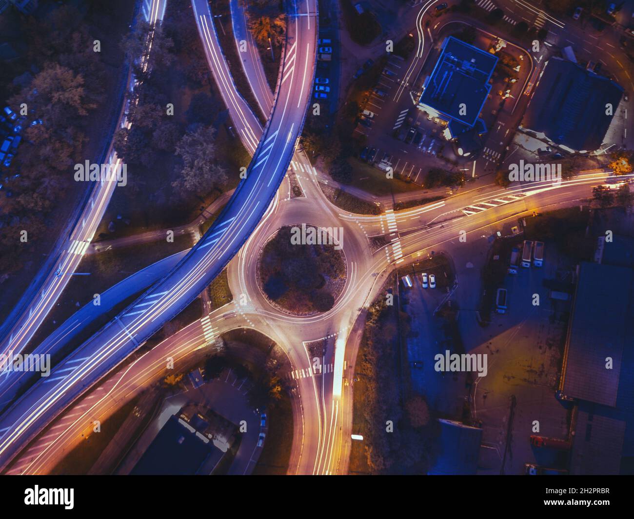 Transportation, drone long exposure shot of cars on road intersection ...