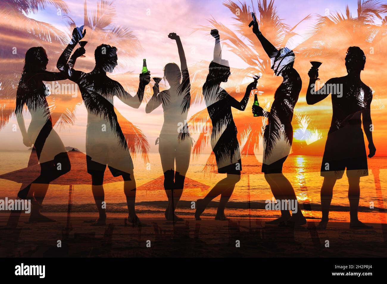 tropical beach party, group of young people dancing, friends drinking ...