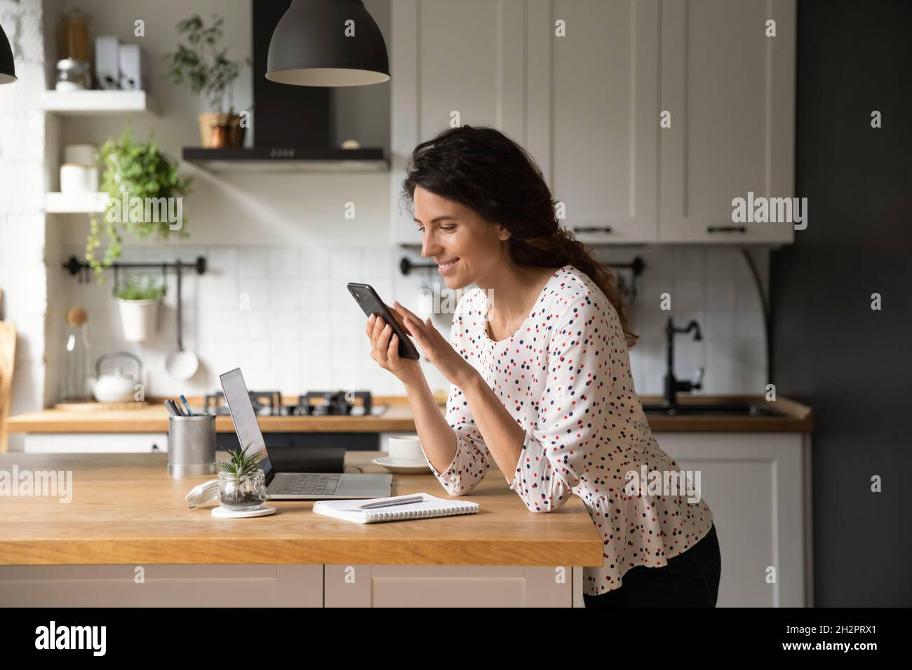 Young latin woman working hi-res stock photography and images - Alamy