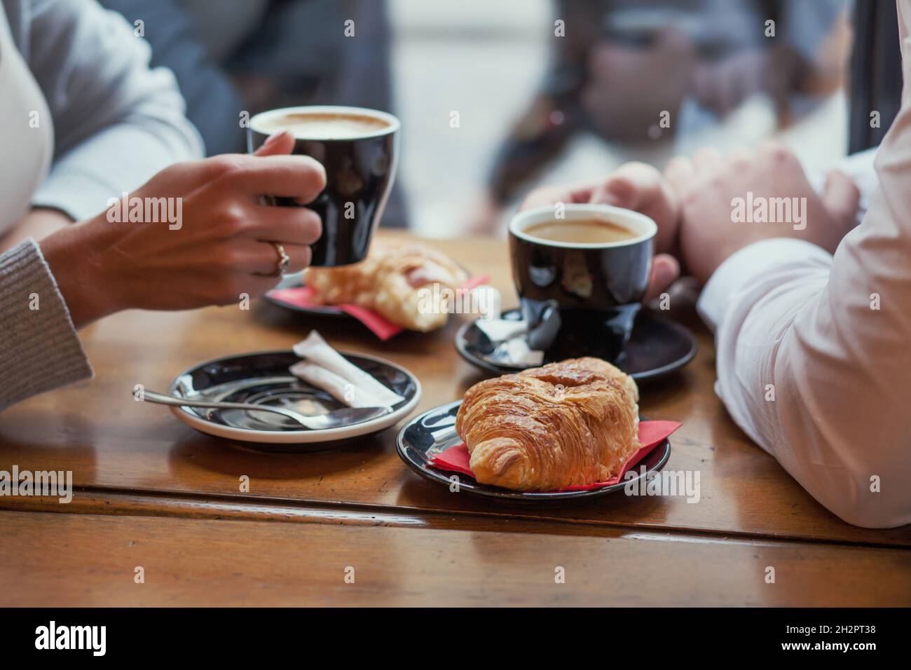 croissants and coffee, french breakfast in cafe in Paris for couple ...