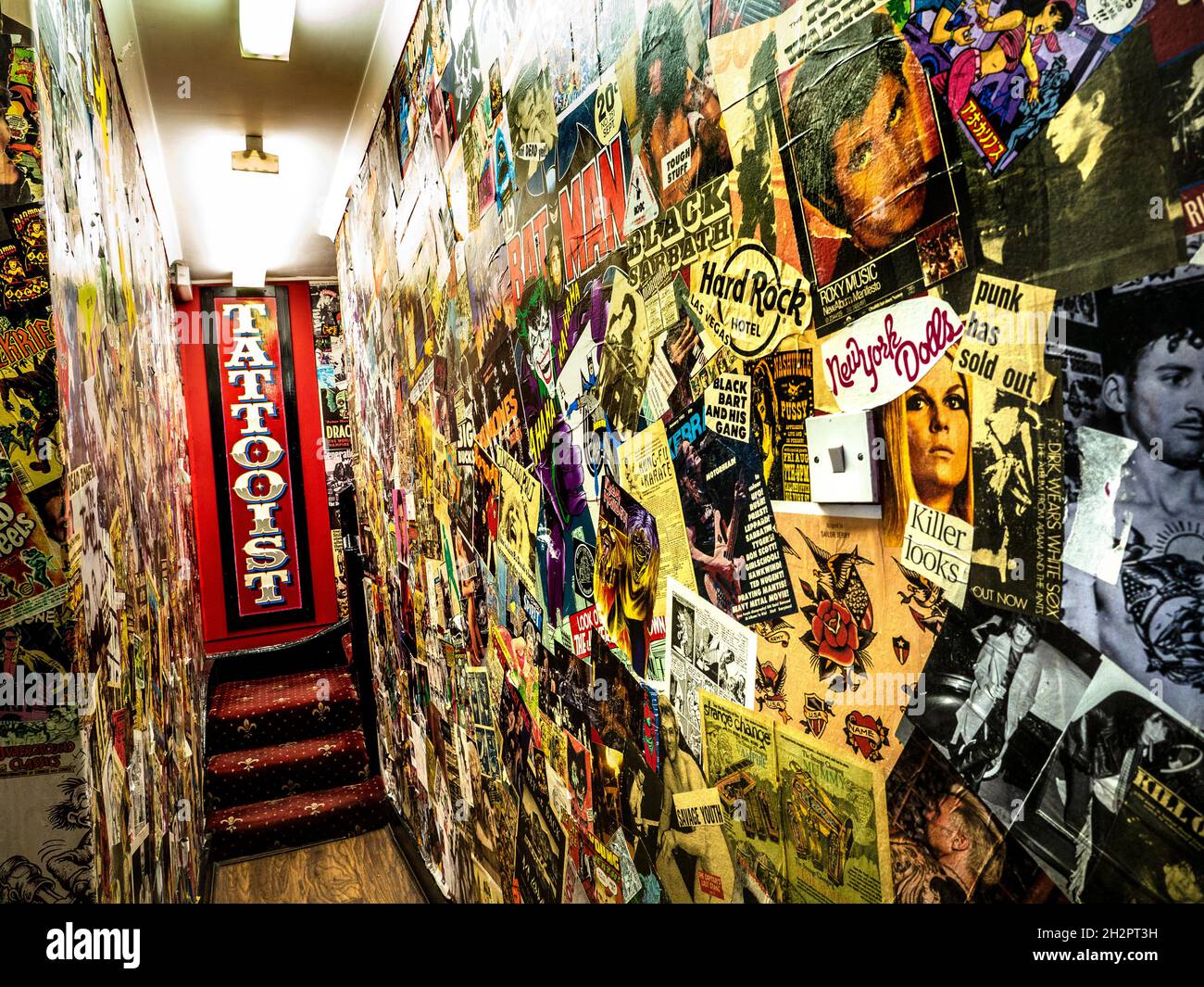 Tattooist business with on trend entrance, pop and scrap art on walls ...
