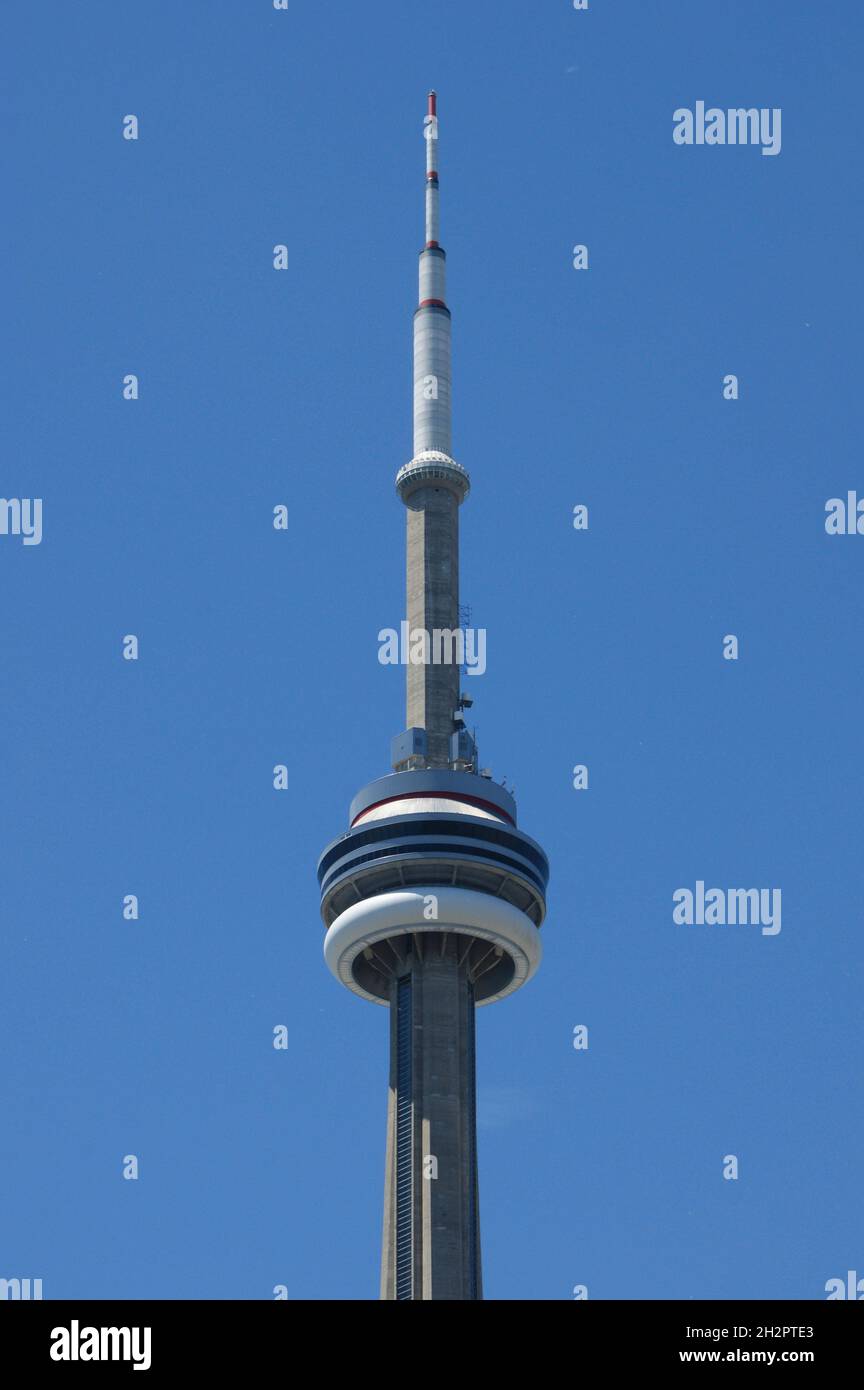 Vertical low angle shot of the tall CN Tower in Toronto, Canada under a ...