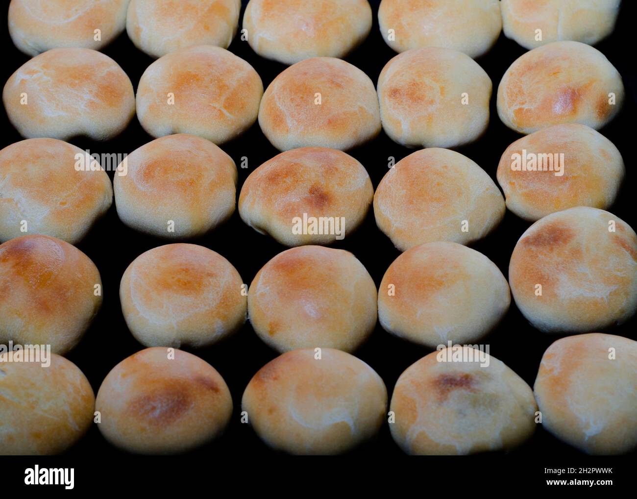 Homemade vegetable bun on isolated black background Stock Photo - Alamy