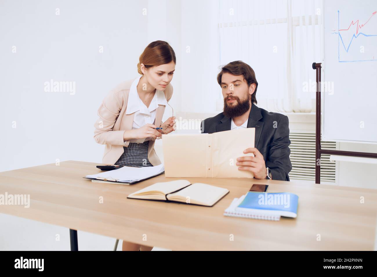 work colleagues office emotions work desk communication Stock Photo - Alamy