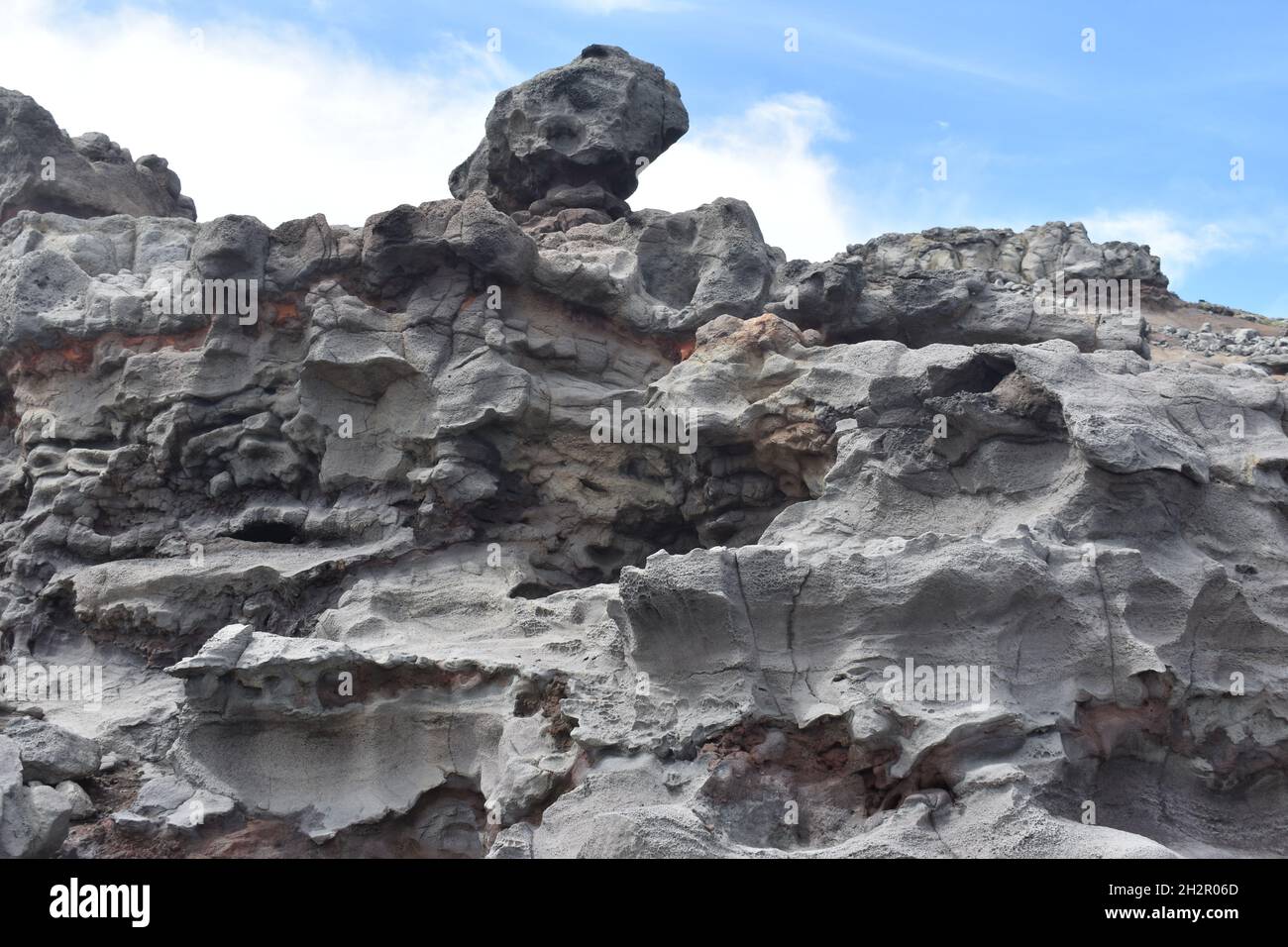 Closeup shot of volcanic rocks under a cloudy sky in Maui, Hawaii Stock ...