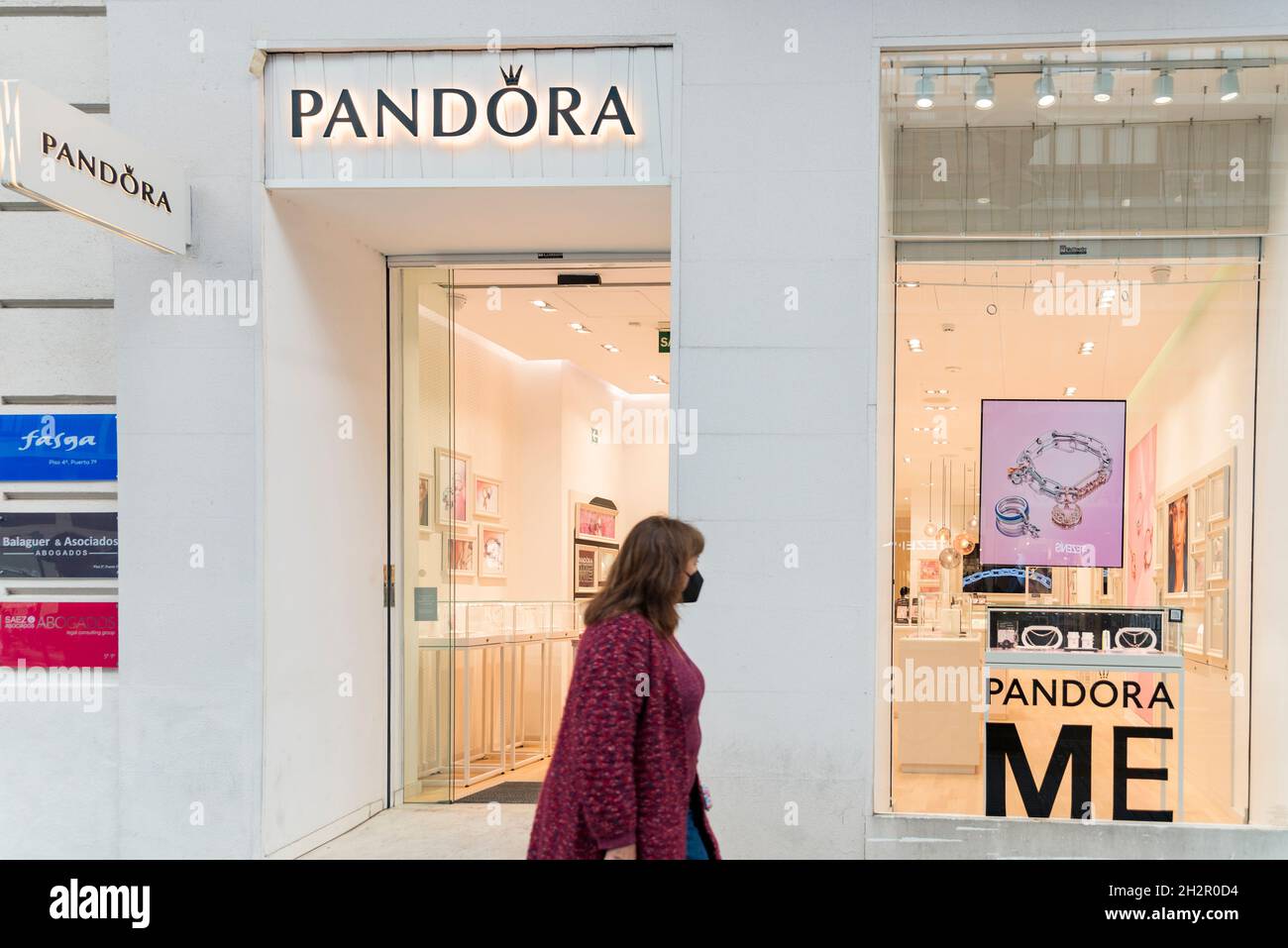 A woman passes in front of Pandora jewellers in Valencia. (Photo by ...