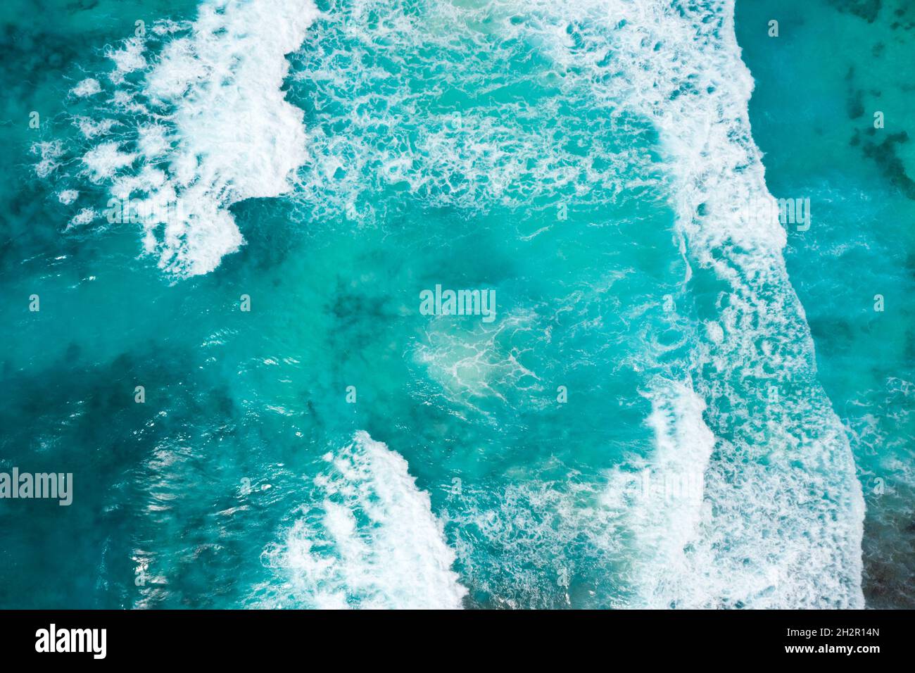Blue ocean texture with waves and foam. La Digue Island, Seychelles ...