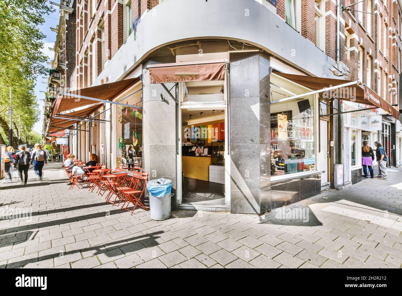 Stylish shop on the ground floor of the building Stock Photo - Alamy