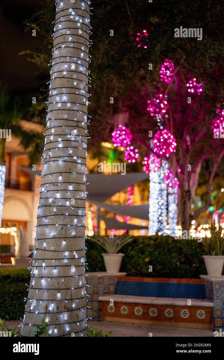 Night photo of pink holiday tree ornaments Stock Photo - Alamy