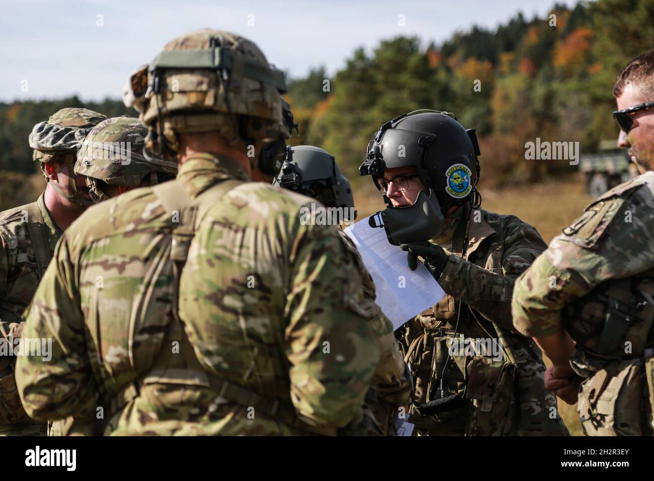 A U.S. Army helicopter crew member assigned to the 1st Combat Aviation ...