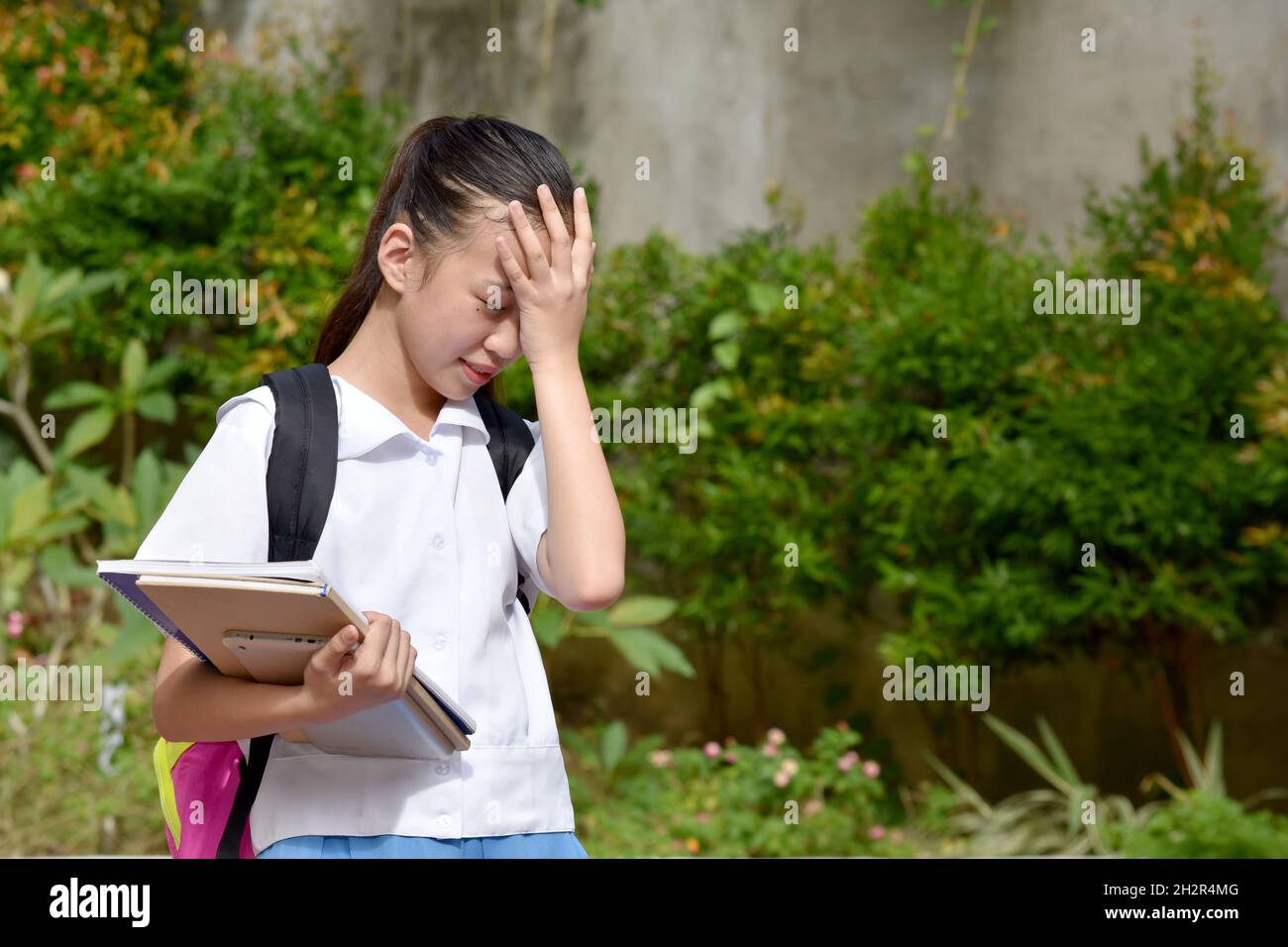 Girl Student And Disappointment With School Books Stock Photo - Alamy