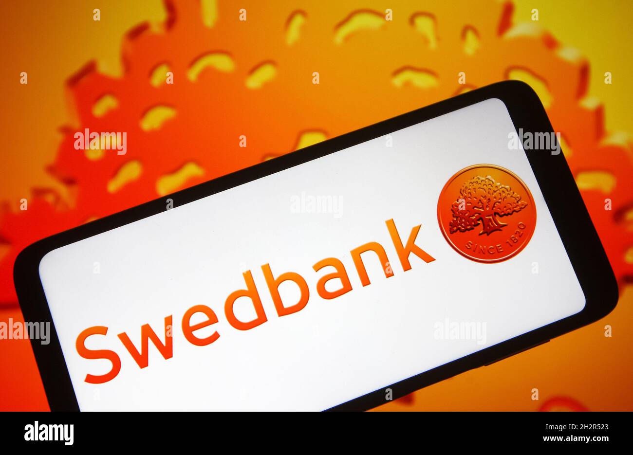In this photo illustration a Swedbank AB logo is seen on a smartphone screen. (Photo by Pavlo ...