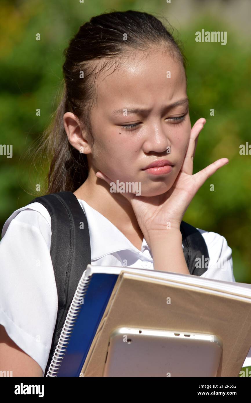 A Youthful Female Student With Toothache Stock Photo - Alamy
