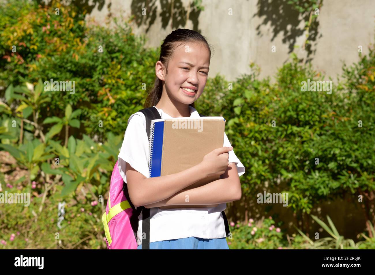 Girl Student And Happiness Wearing Backpack Stock Photo - Alamy