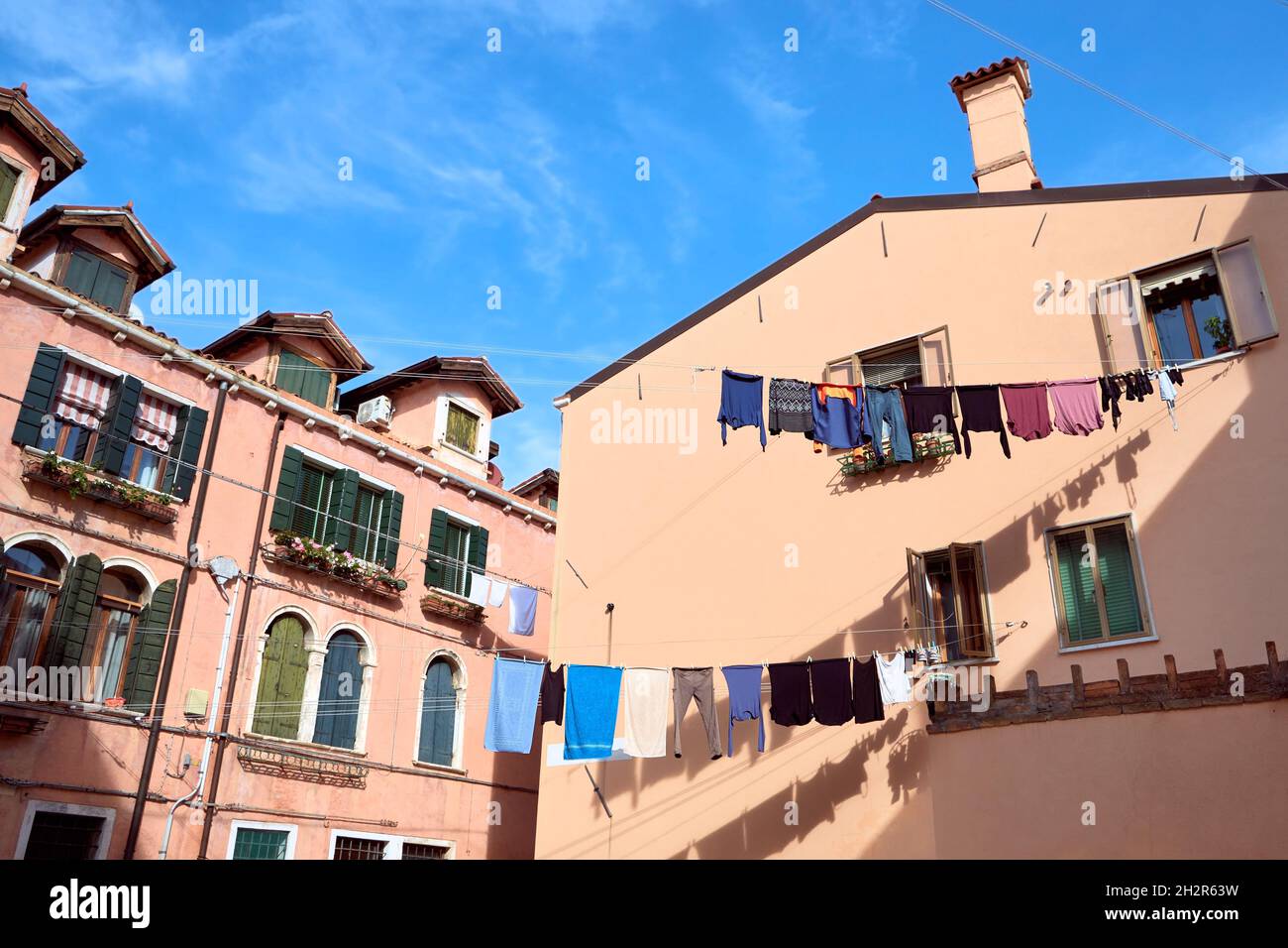 Washing lines in an alley in Venice, Italy. Laundry hanging on a ...