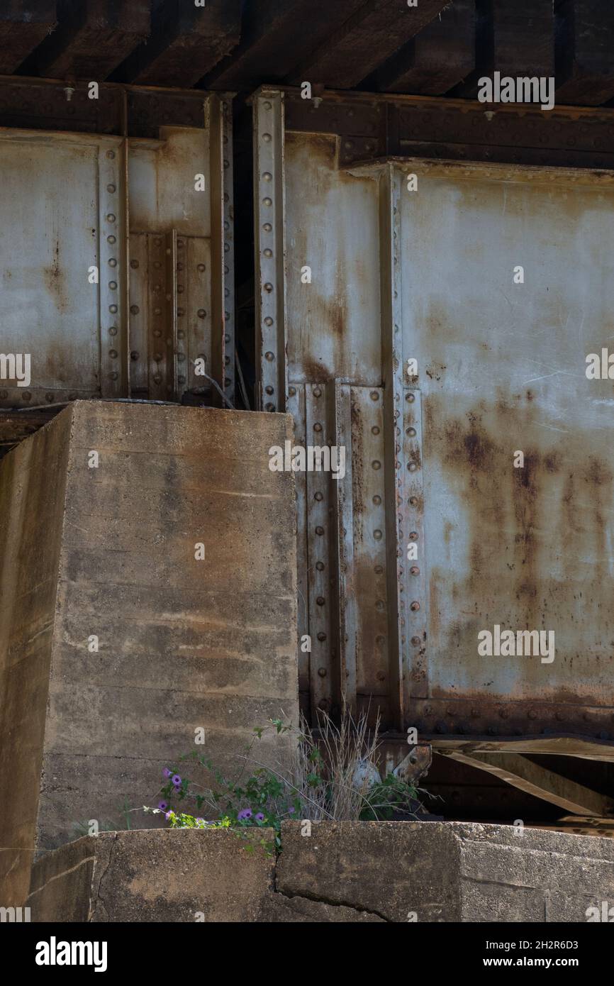 Concrete and metal underside of a bridge Stock Photo - Alamy