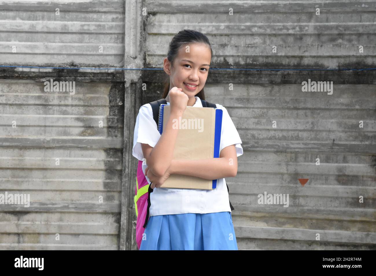 Successful Filipina Female Student Wearing Uniform Stock Photo - Alamy