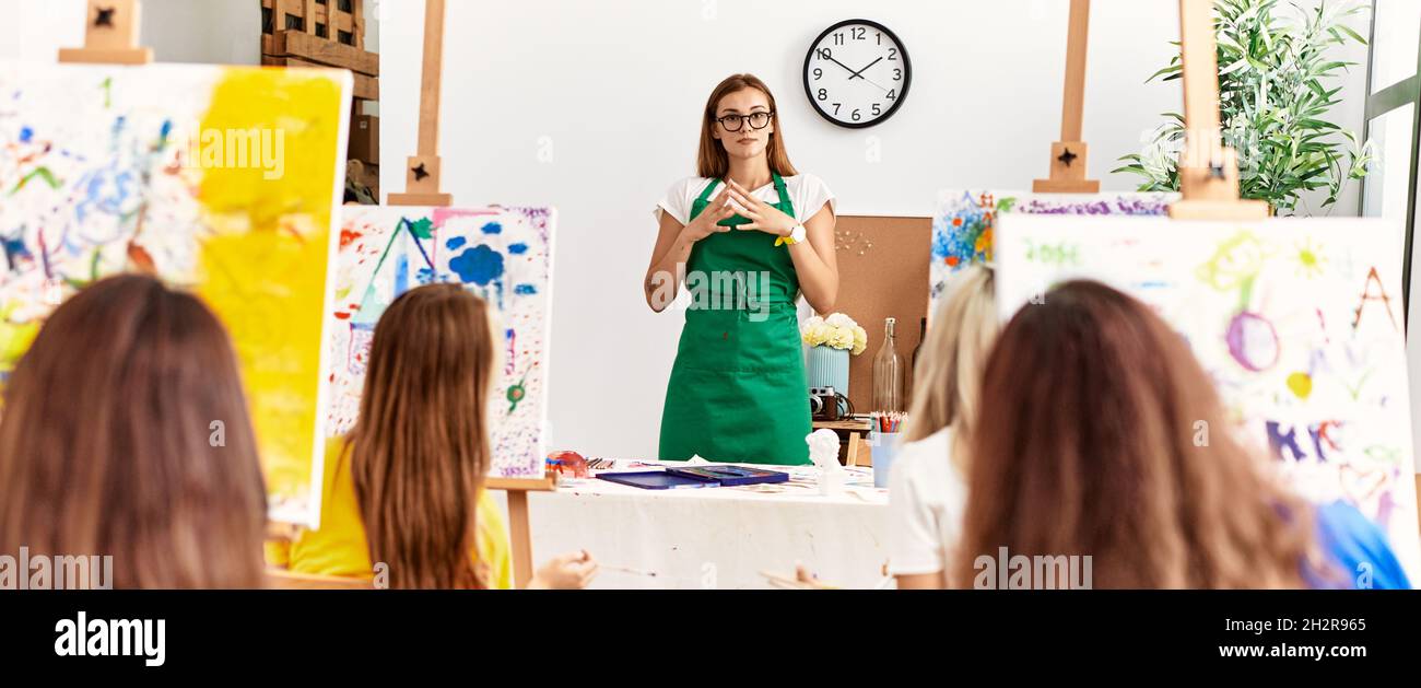 Group of young artist girls having draw lesson at art studio Stock ...
