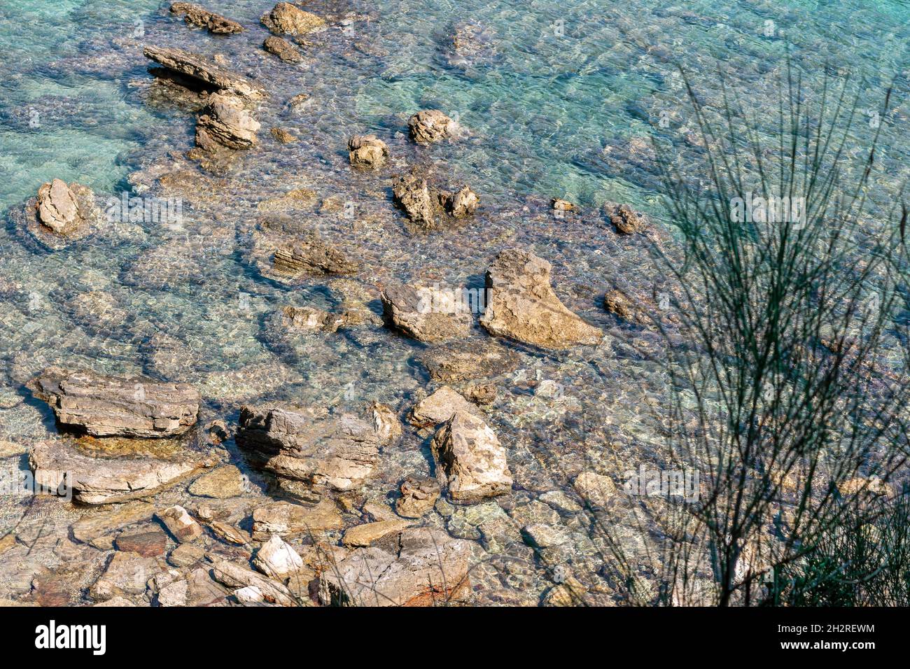 Coastal rocks in the ocean water . Pacific Ocean coast with big rocks ...
