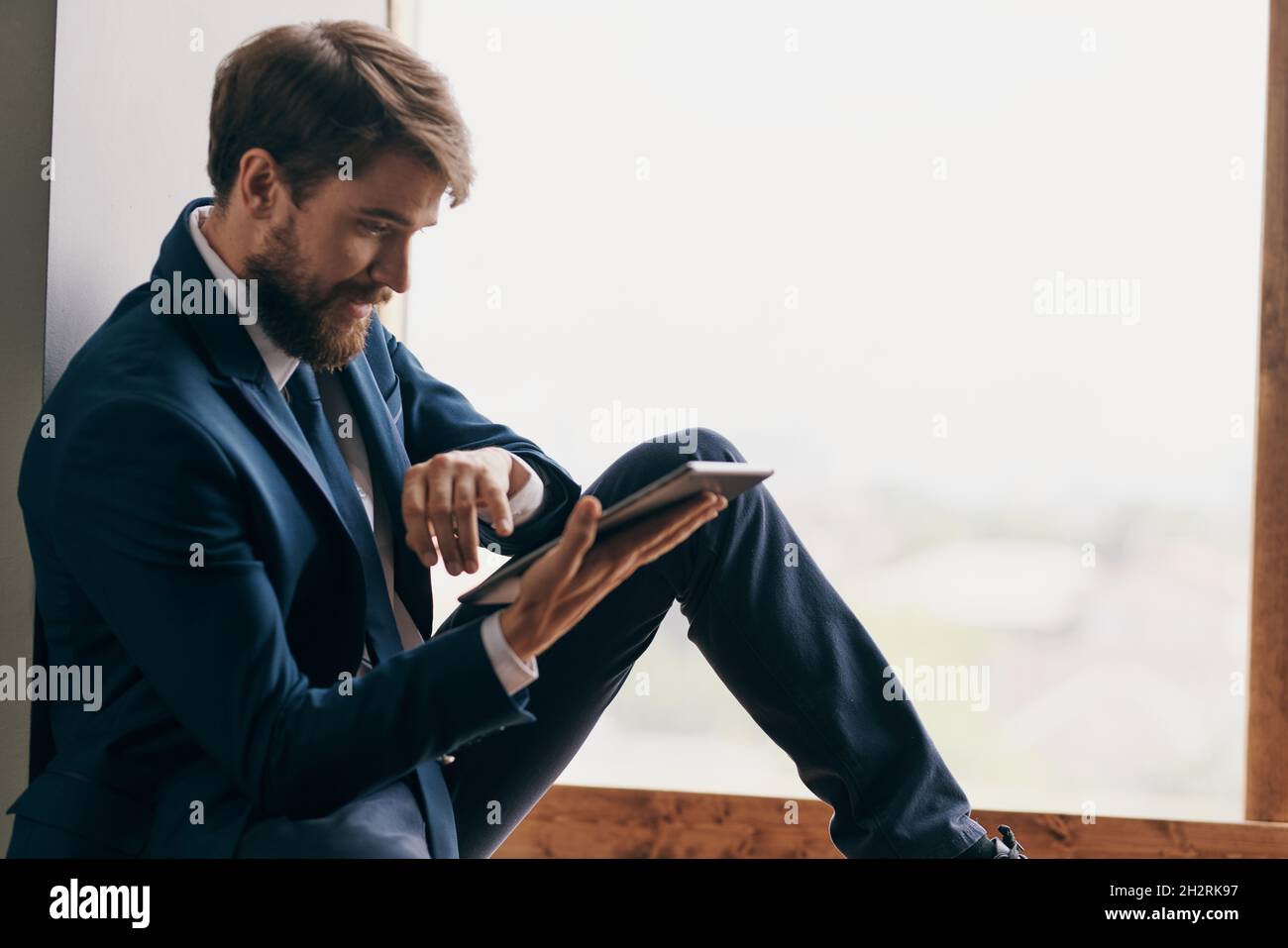businessmen near the window with a laptop technology Stock Photo - Alamy businessmen near the window with a laptop technology Stock Photo - Alamy