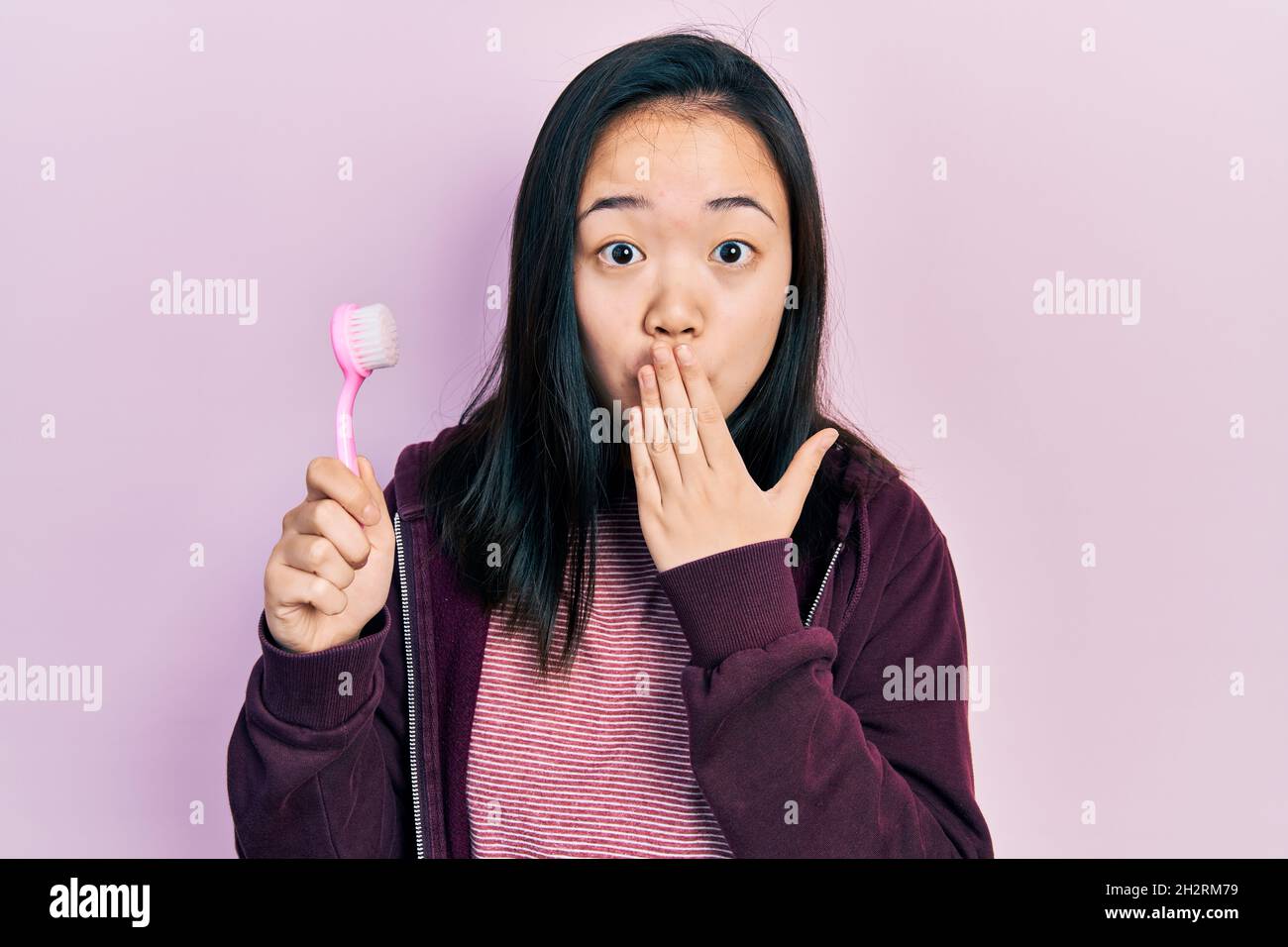 Female facial expression of shame hi-res stock photography and images ...