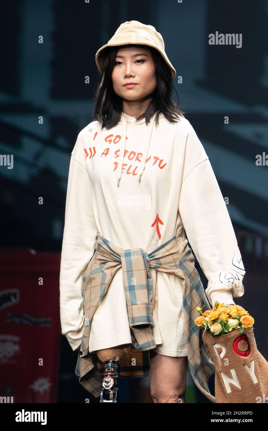 SHANGHAI, CHINA - OCTOBER 14, 2021 - Niu Yu, a survivor of the Wenchuan ...