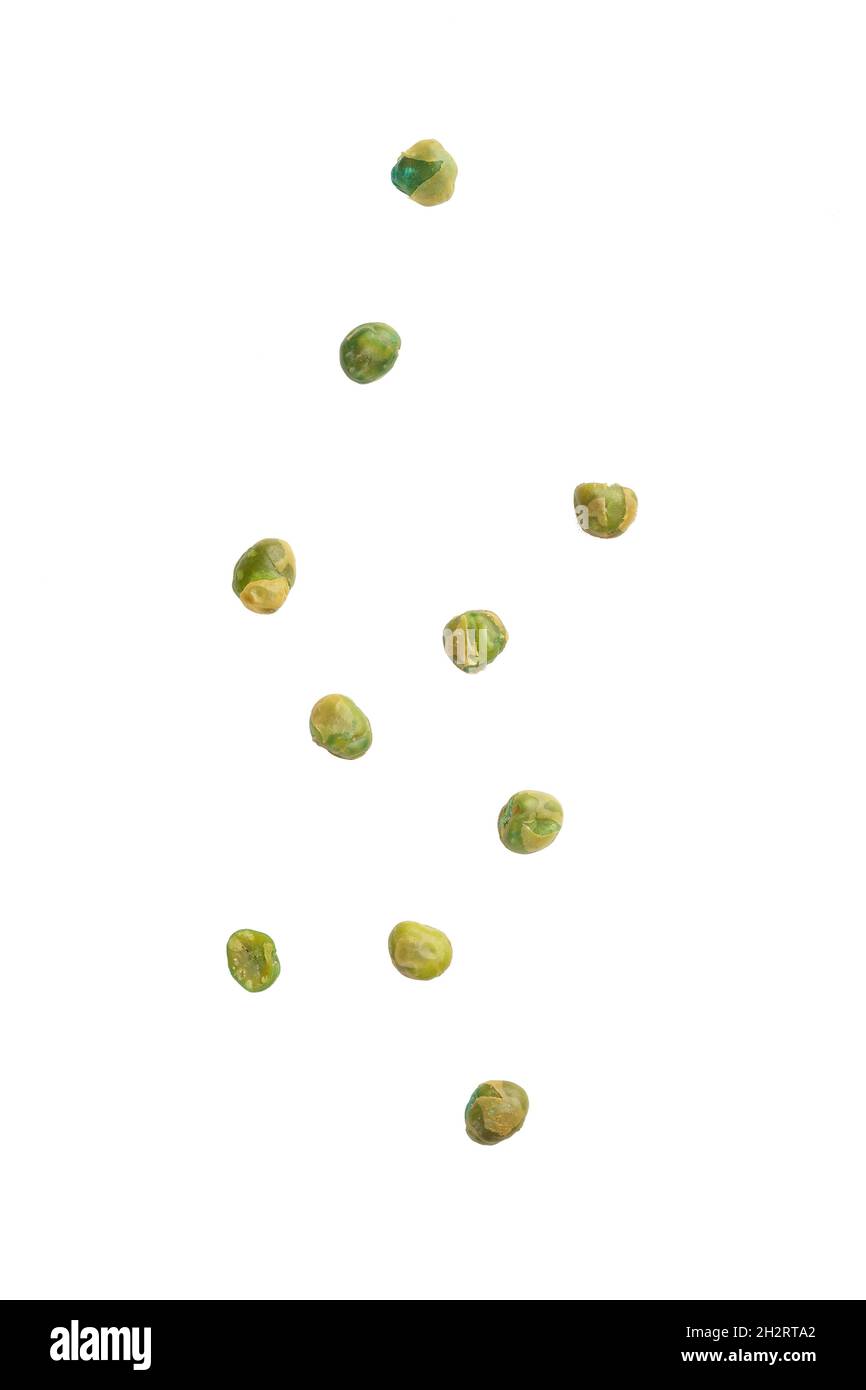 Salted green peas falling isolated on white background with clipping ...
